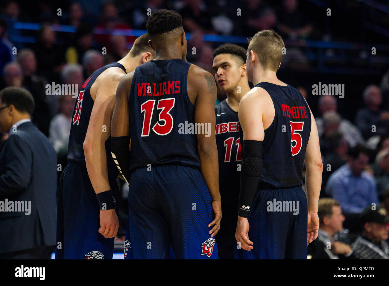 Winston-Salem, NC, USA. 14th Nov, 2017. Liberty players huddle during a ...