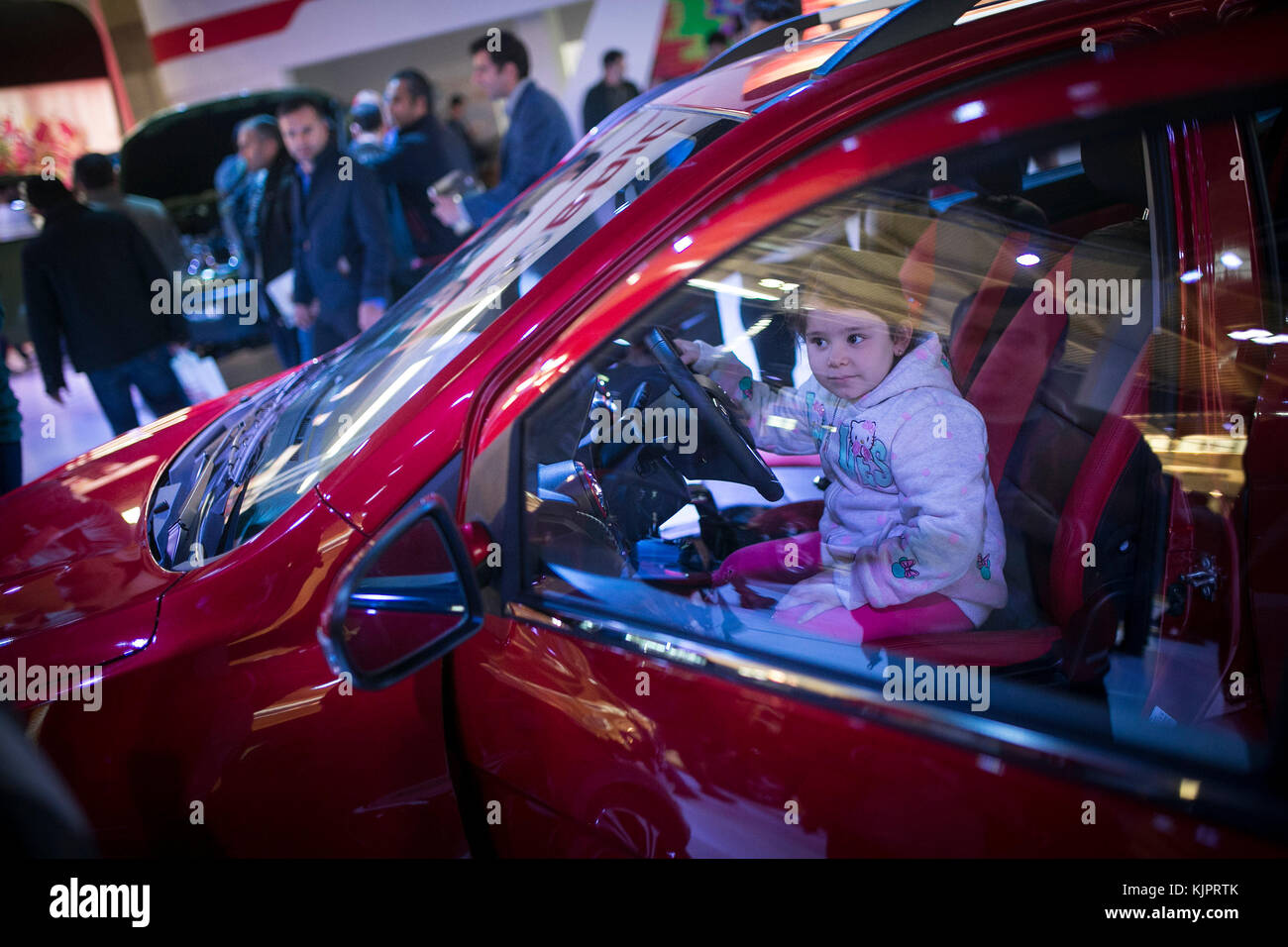 Tehran, Iran. 29th Nov, 2017. A girl sits in a car during the Tehran ...