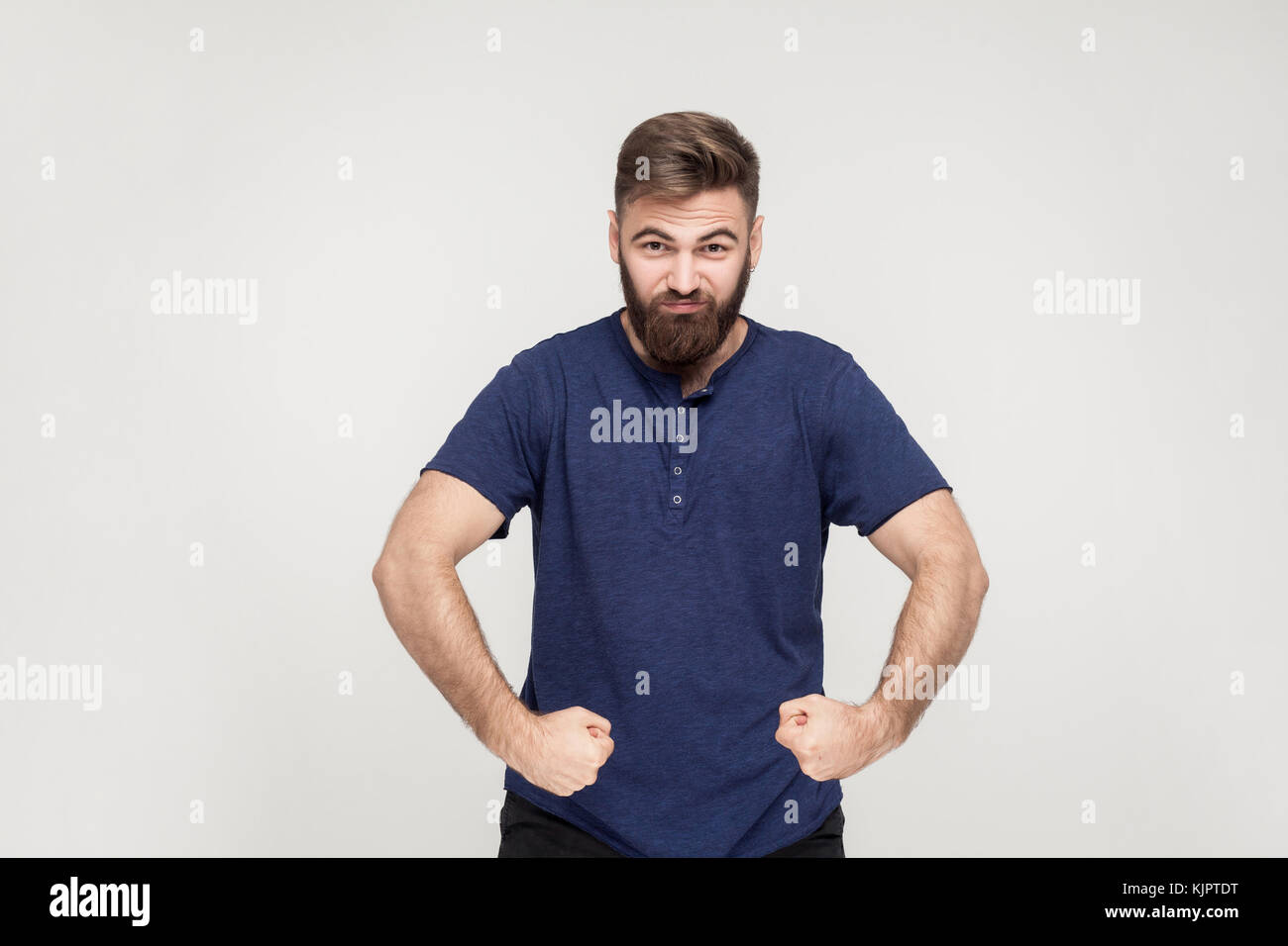 Popeye the Sailor style. Masculinity and strong bearded man posing and ...