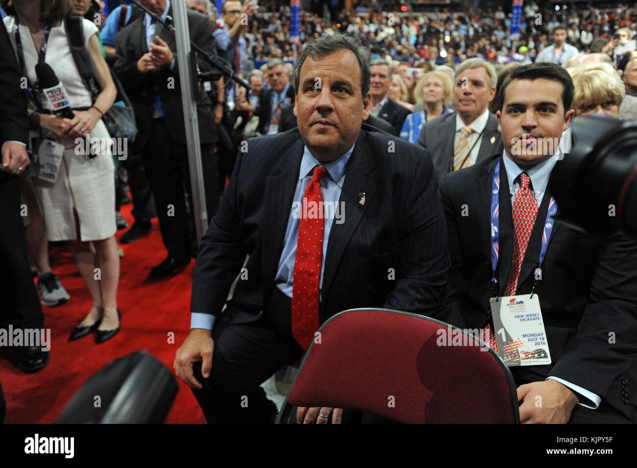 CLEVELAND, OH - JULY 18: Andrew Christie (R) speaks with his father ...