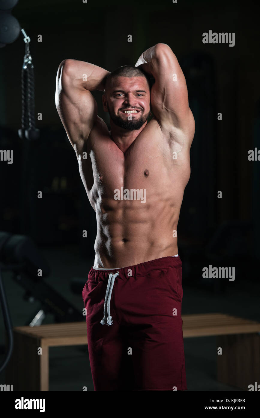 Portrait Of A Young Physically Fit Man Showing His Well Trained Body ...