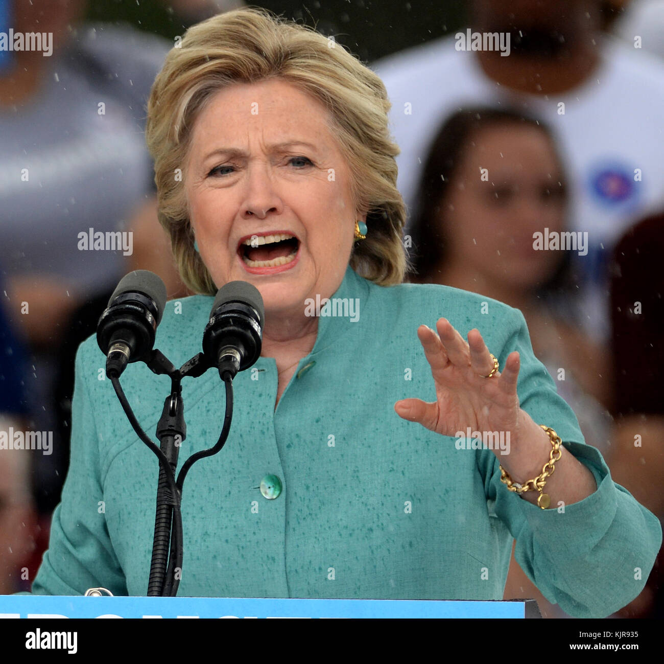 PEMBROKE PINES, FL - NOVEMBER 05: Supporters look in the pouring rain ...