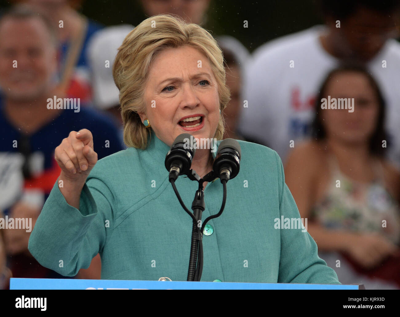 PEMBROKE PINES, FL - NOVEMBER 05: Supporters look in the pouring rain ...