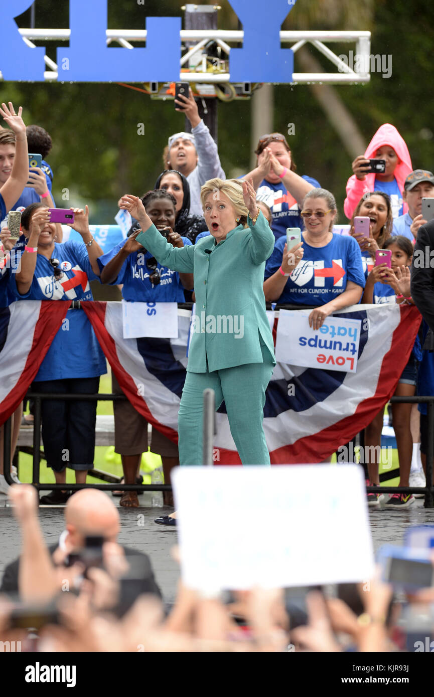 PEMBROKE PINES, FL - NOVEMBER 05: Supporters look in the pouring rain ...