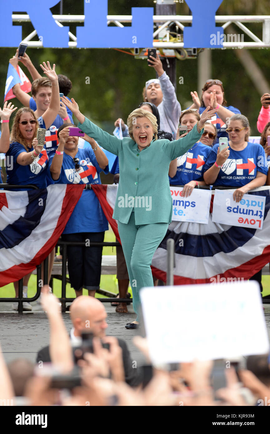 PEMBROKE PINES, FL - NOVEMBER 05: Supporters look in the pouring rain ...