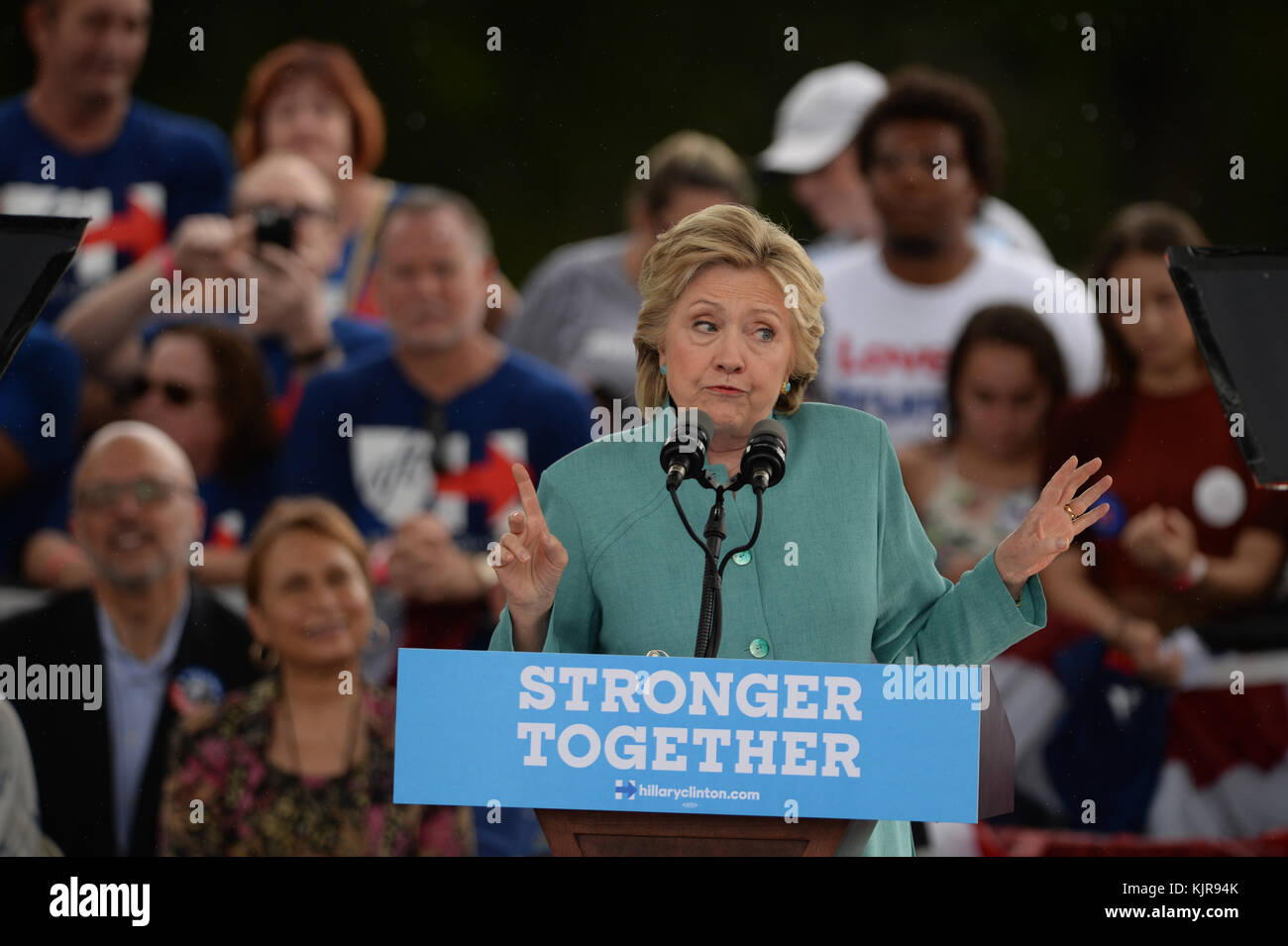 PEMBROKE PINES, FL - NOVEMBER 05: Supporters look in the pouring rain ...