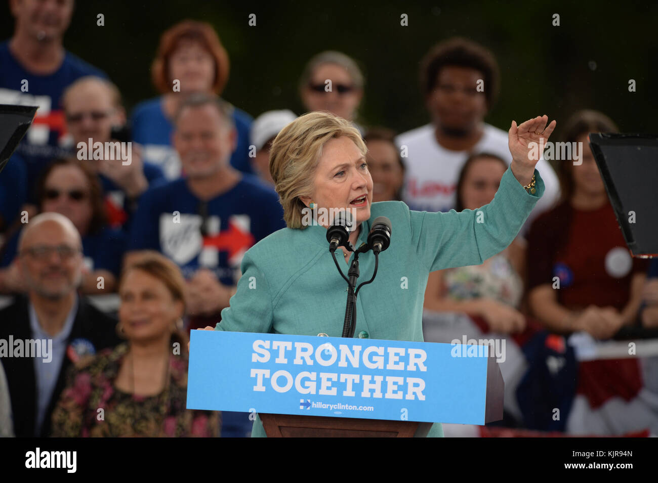 PEMBROKE PINES, FL - NOVEMBER 05: Supporters look in the pouring rain ...