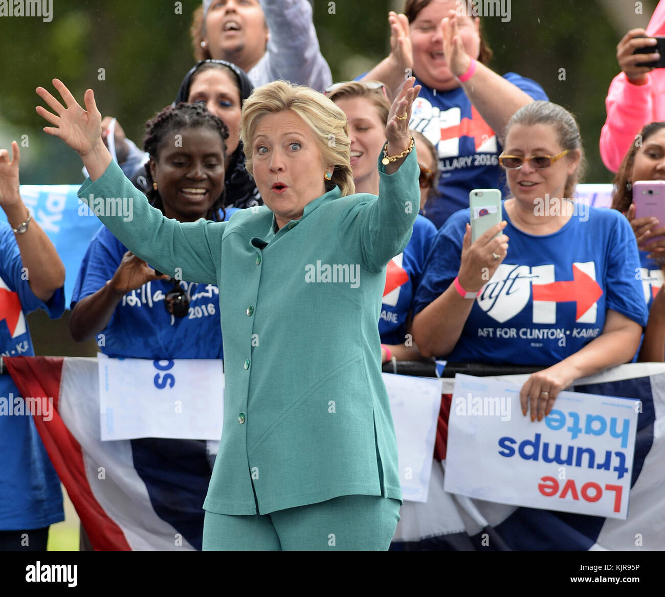 PEMBROKE PINES, FL - NOVEMBER 05: Supporters look in the pouring rain ...