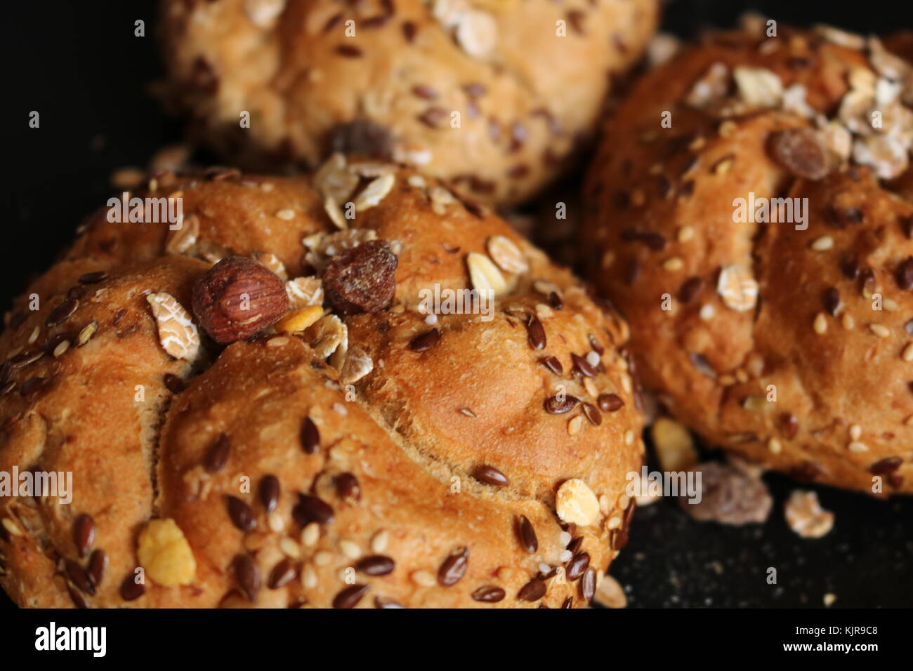 Fresh Delicious Buns on a dark background Stock Photo - Alamy