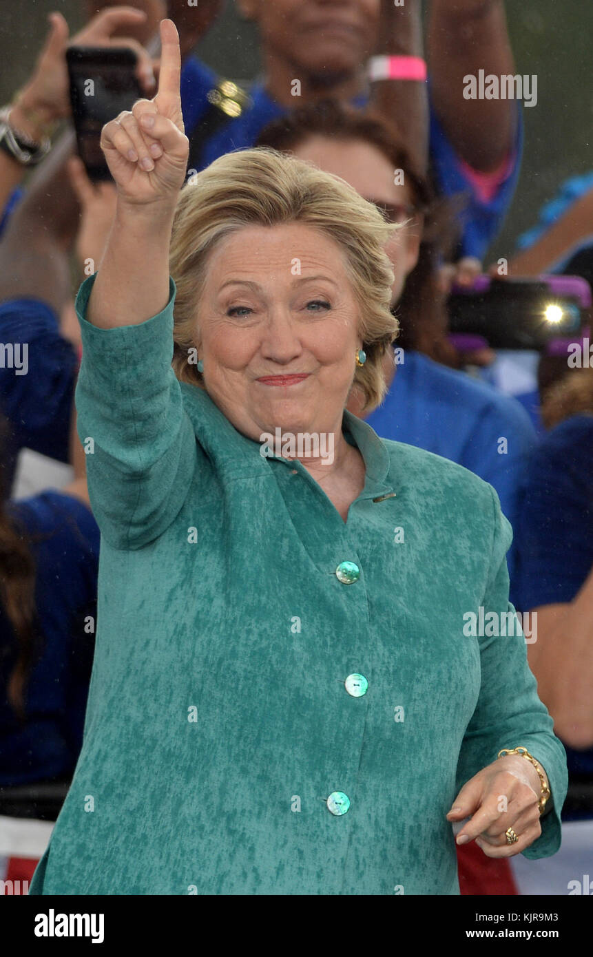 PEMBROKE PINES, FL - NOVEMBER 05: Supporters look in the pouring rain ...