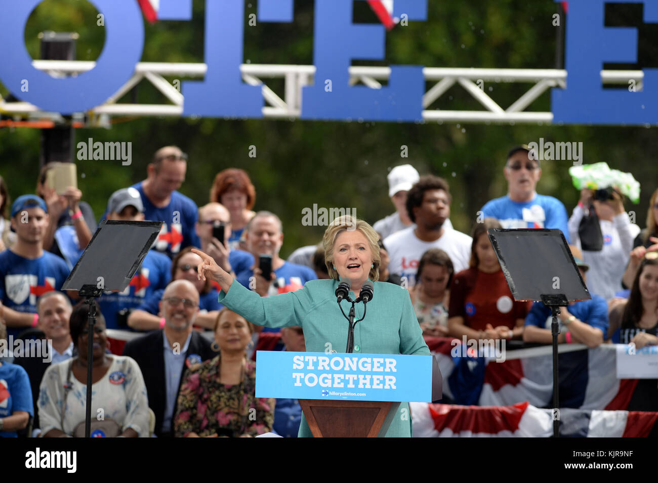 PEMBROKE PINES, FL - NOVEMBER 05: Supporters look in the pouring rain ...