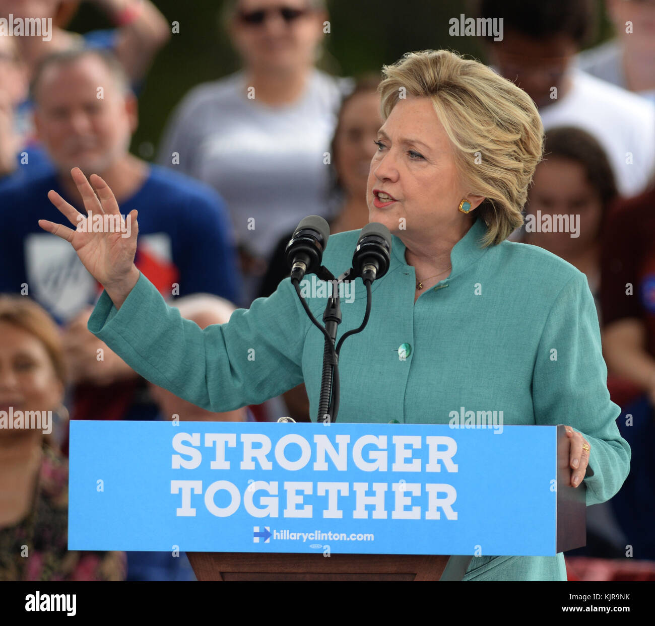 PEMBROKE PINES, FL - NOVEMBER 05: Supporters look in the pouring rain ...