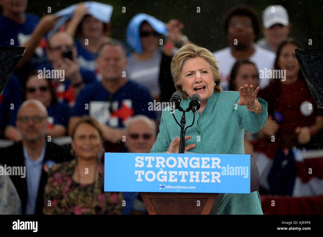 PEMBROKE PINES, FL - NOVEMBER 05: Supporters look in the pouring rain ...