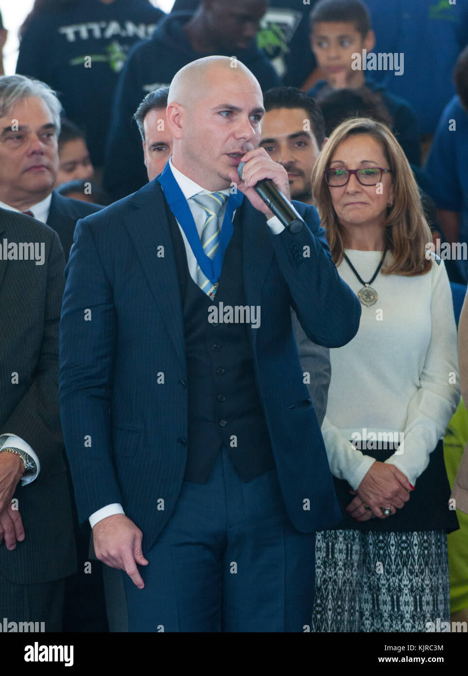 MIAMI, FL - JANUARY 15: Pitbull, Governor Rick Scott, Mayor Tomas ...