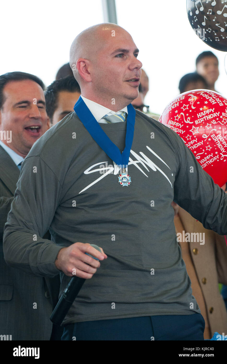 MIAMI, FL - JANUARY 15: Pitbull, Governor Rick Scott, Mayor Tomas ...