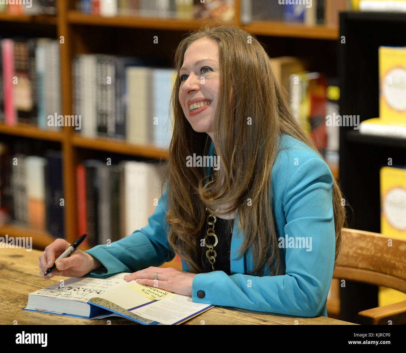 CORAL GABLES, FL - OCTOBER 22: Chelsea Clinton signs copies of her new ...