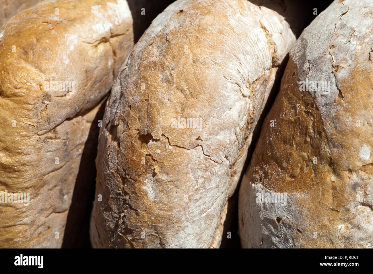 large loaves of bread traditionally roasted Stock Photo - Alamy