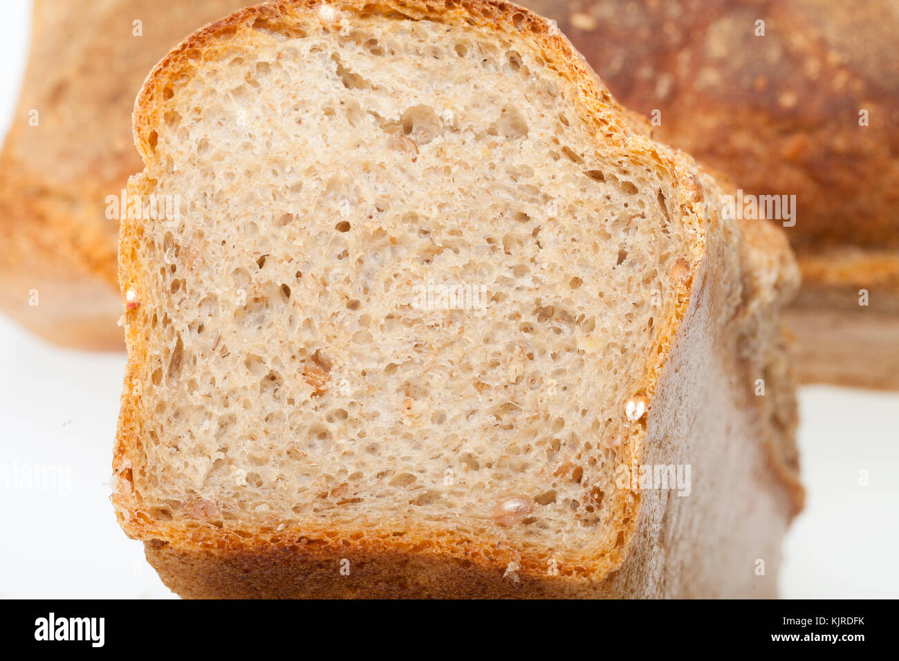 loaves of bread traditionally roasted. Background. Close up Stock Photo ...