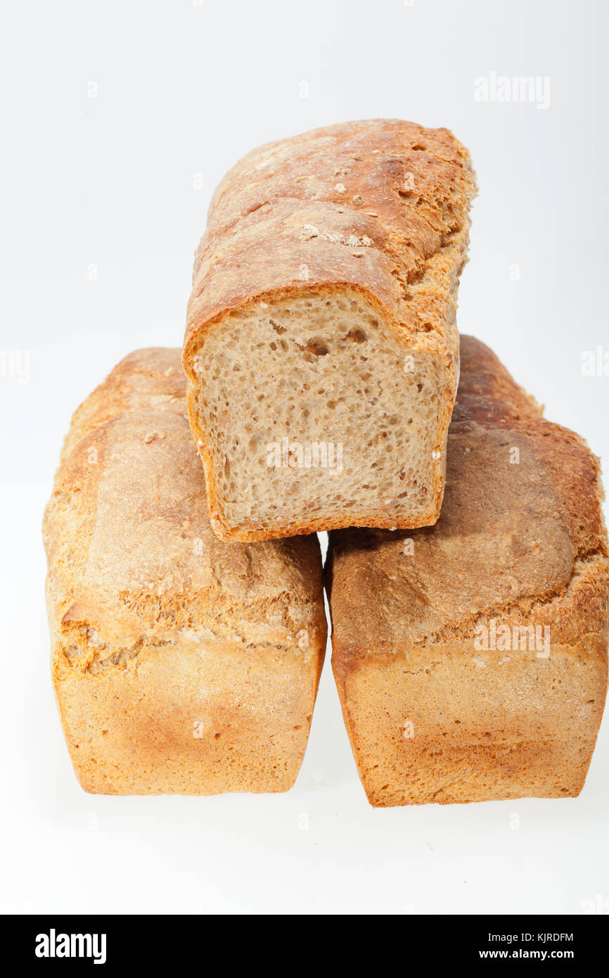 loaves of bread traditionally roasted. Background. Close up Stock Photo ...