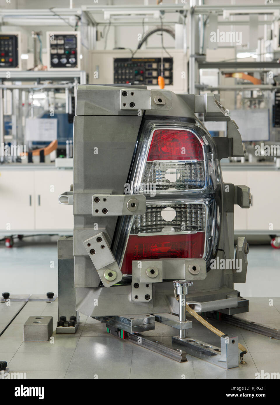 close-up factory equipment of quality control of automobile headlight ...