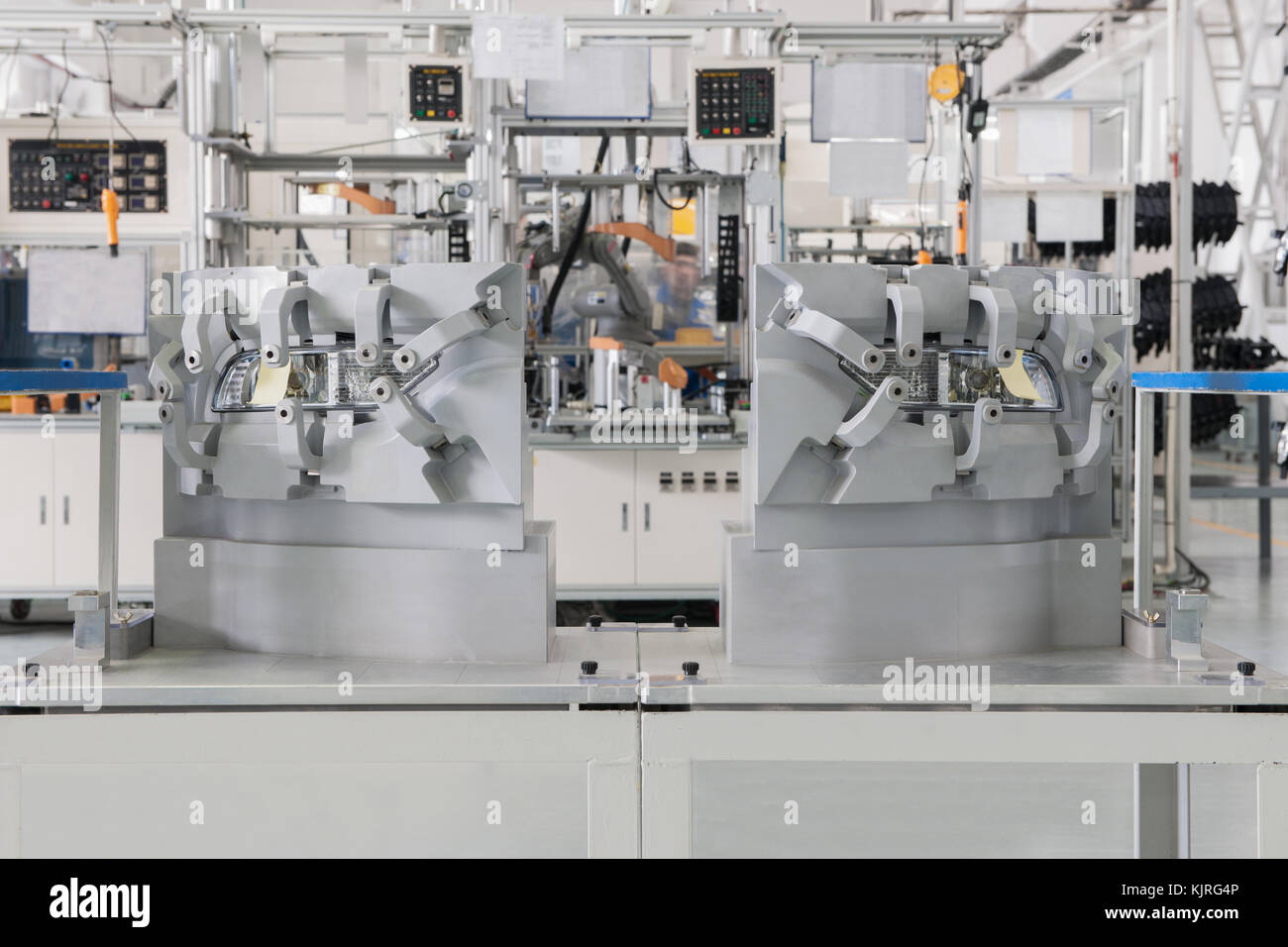 factory equipment of quality control of car headlight. testing for ...