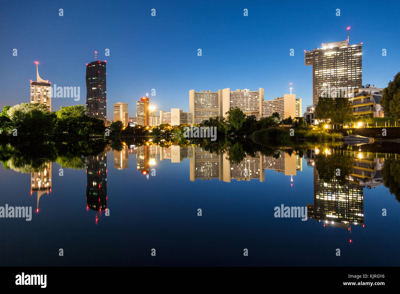 Beautiful Vienna skyline on the Danube river at night Stock Photo - Alamy