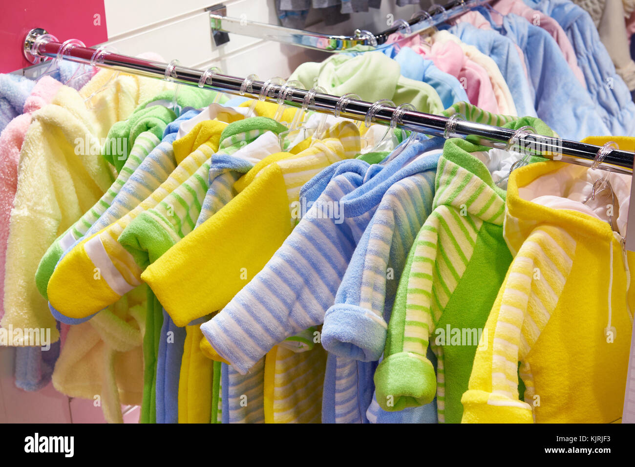 Baby clothes for babies in the store Stock Photo - Alamy