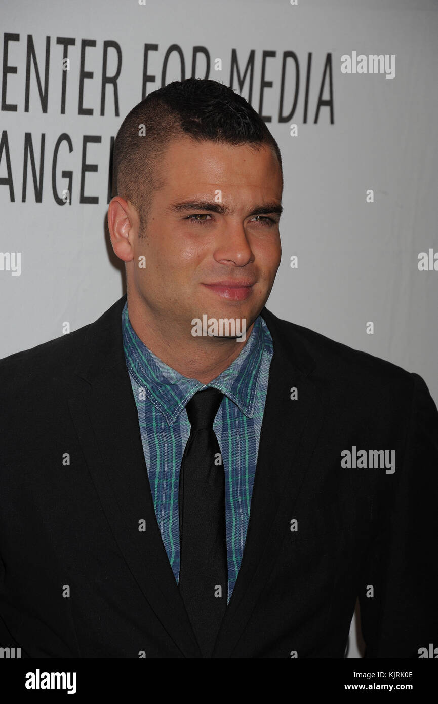 BEVERLY HILLS, CA - MARCH 16: Mark Salling arrives at the 'Glee ...