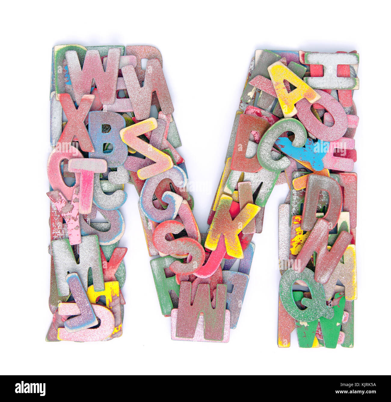 lots of small wooden letters to make up the letter M Stock Photo - Alamy