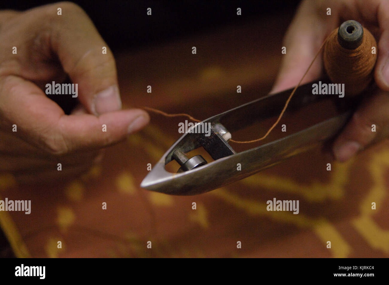 Holding spindle hi-res stock photography and images - Alamy