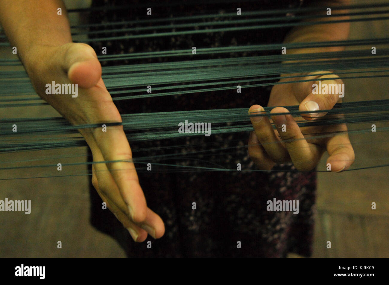 women's hands in the process of weaving cloth Stock Photo - Alamy