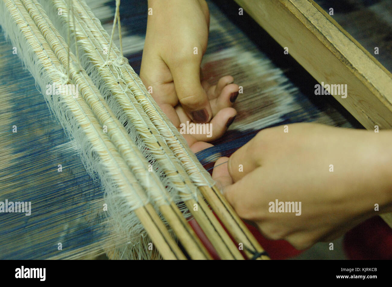 Close up of weaving process hi-res stock photography and images - Alamy
