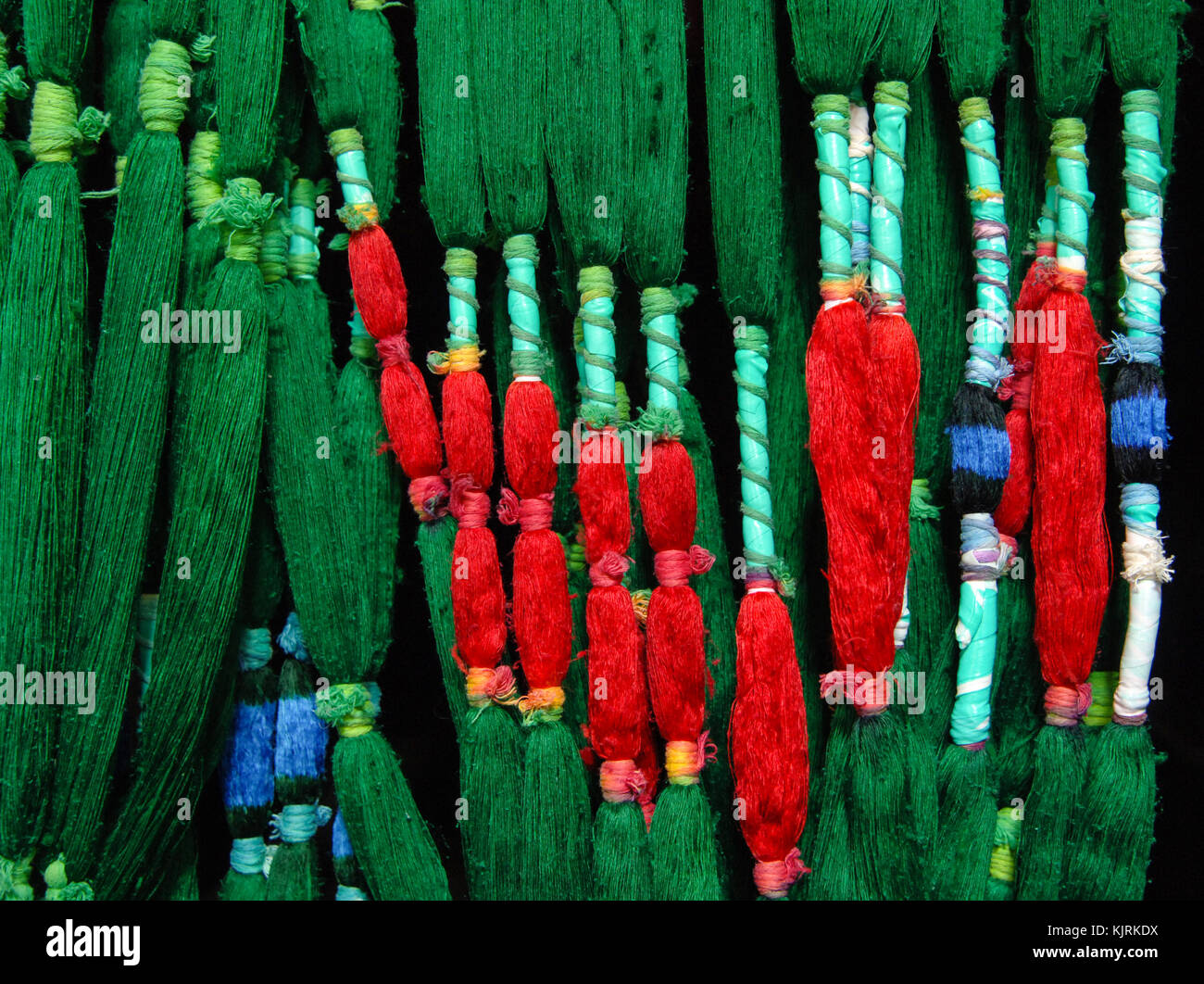 thick related silk weaving thread and yarn closeup Stock Photo - Alamy