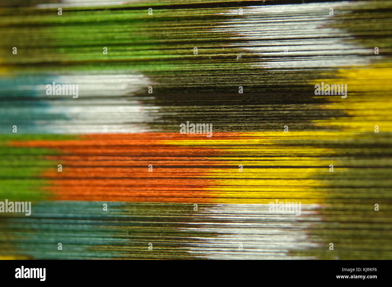 subtle silk weaving thread and yarn closeup Stock Photo - Alamy