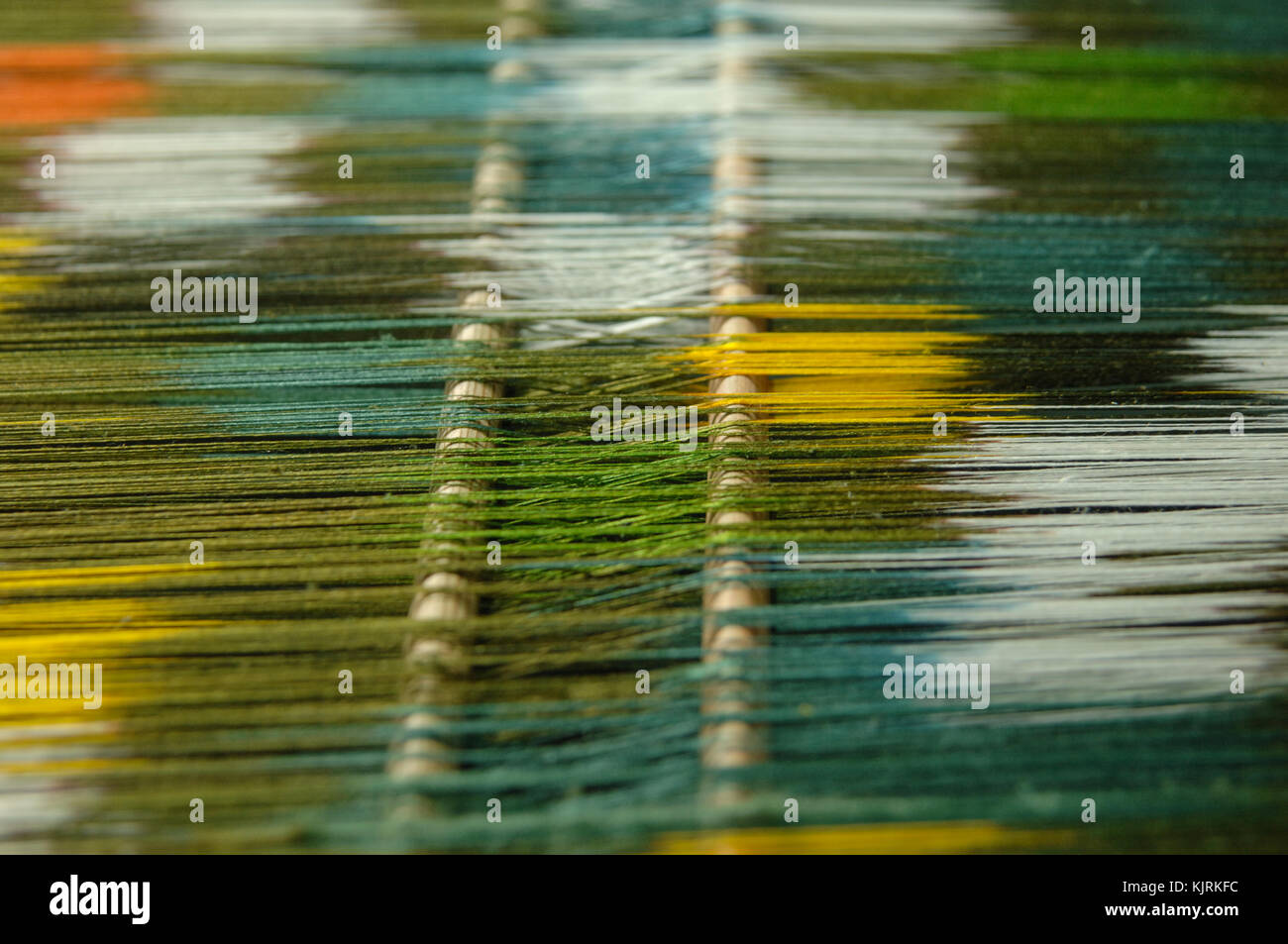 subtle silk weaving thread and yarn closeup Stock Photo - Alamy