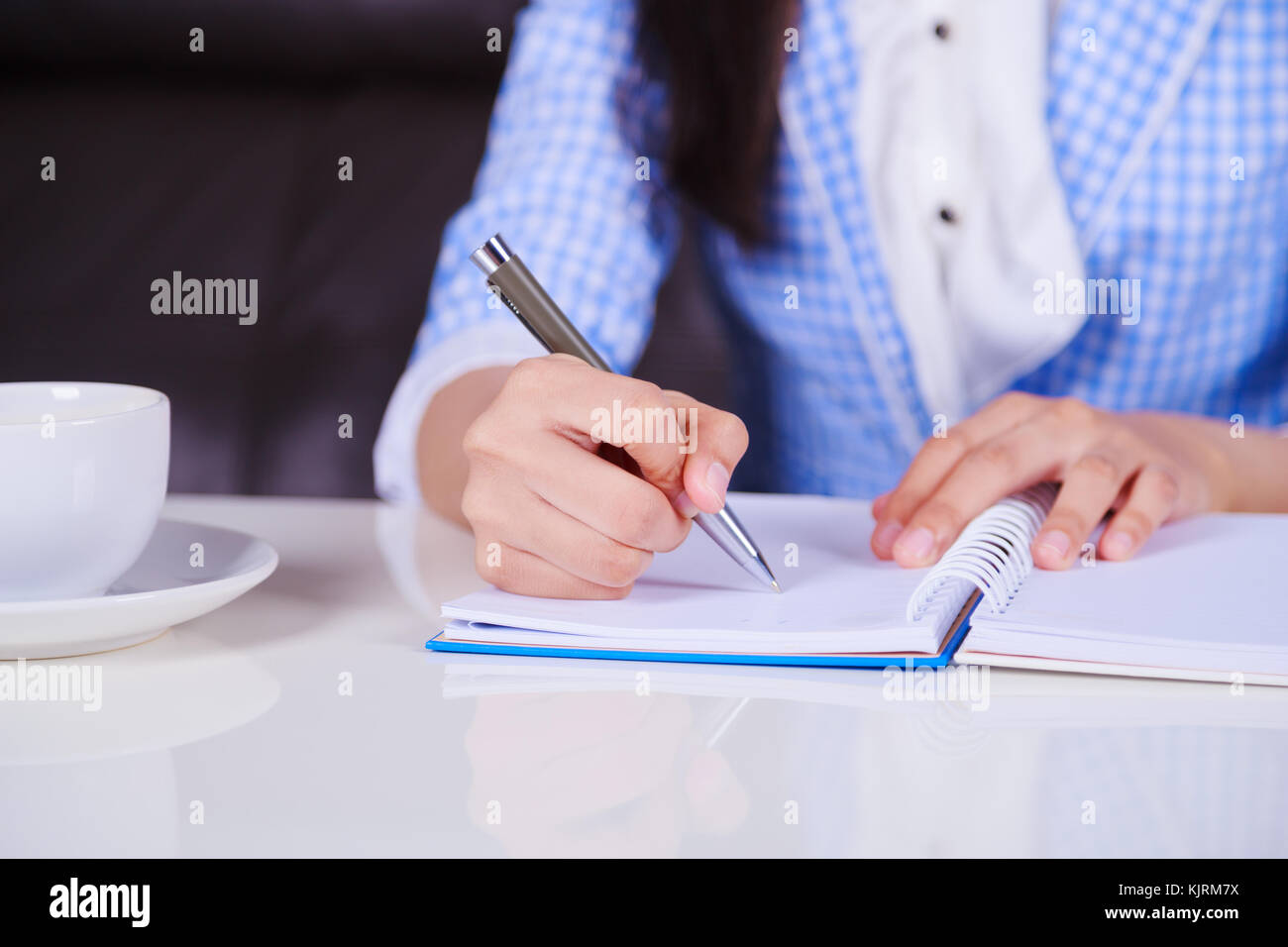 Hand young woman writer writing hi-res stock photography and images - Alamy