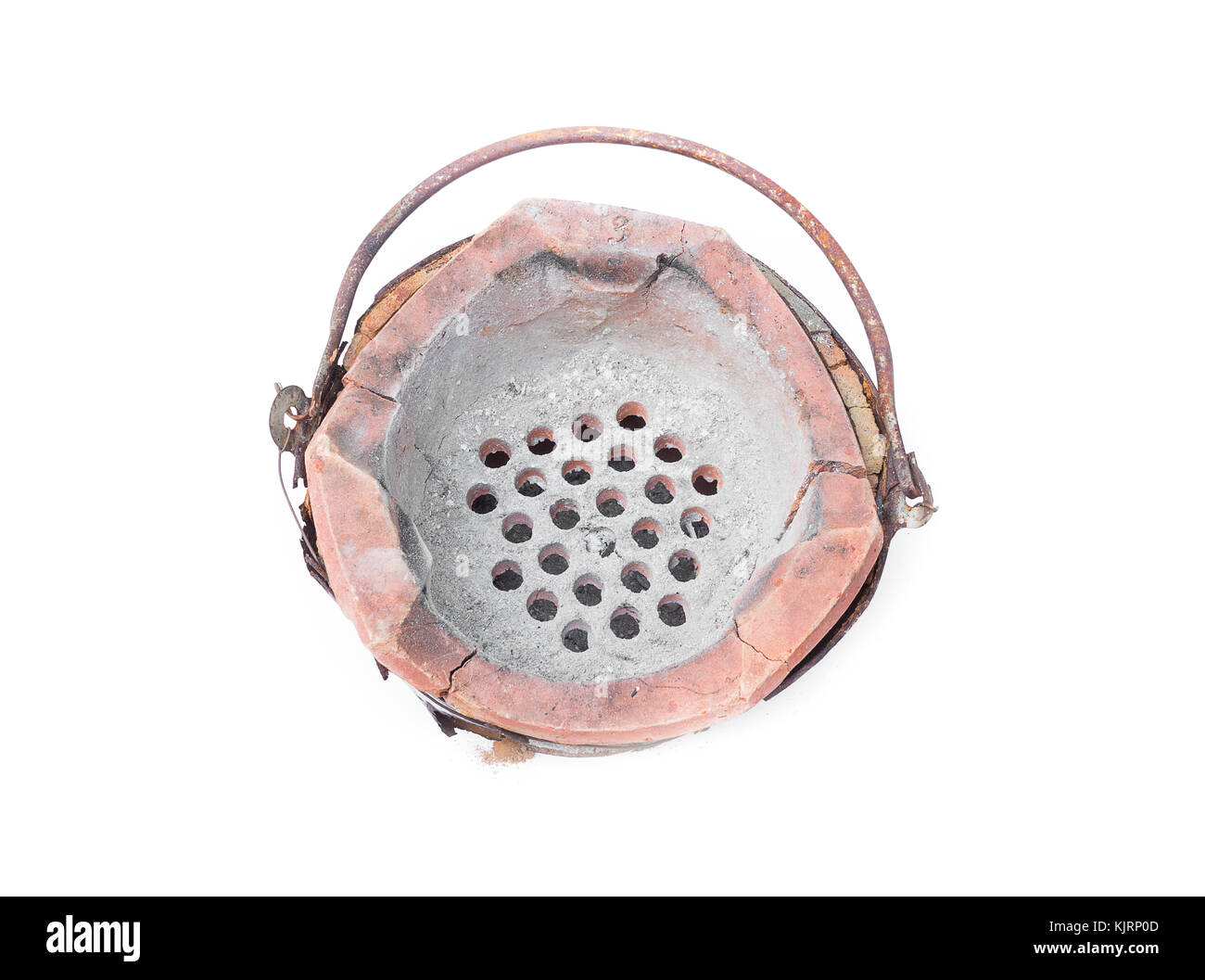 Traditional charcoal burning clay stove, ancient in a rustic house ...