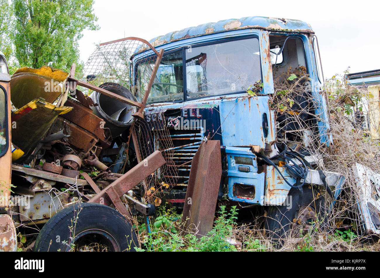 A scrap yard that specifically holds broken down vehicles for scrap and ...