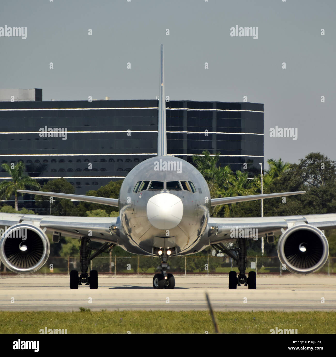 Modern heavy lift jet airplane nose view before takeoff Stock Photo - Alamy