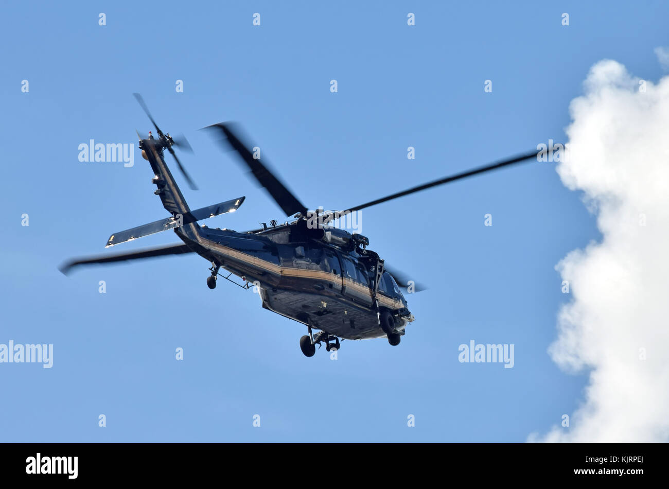 Heavy patrol helicopter rear view Stock Photo - Alamy