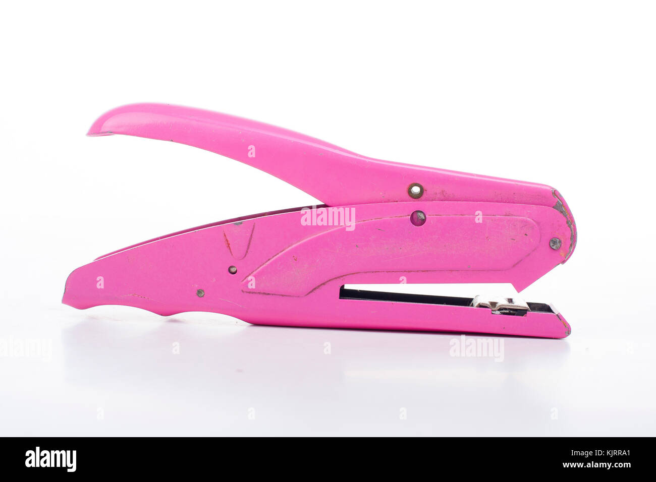 Stapler pink old stapler tool on isolated white studio background ...