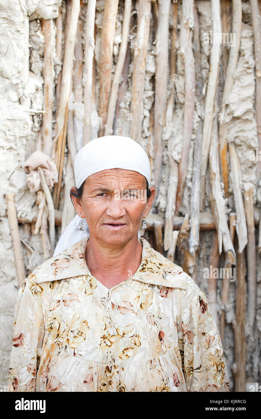 Deriya,China - October 06,2017: Uigur woman receives tourists in her ...