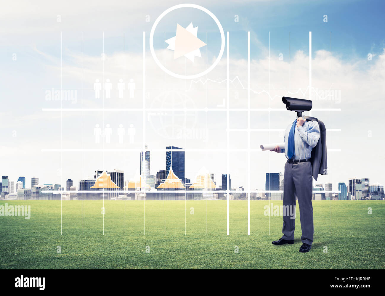 Camera headed man standing on green grass against modern citysca Stock ...
