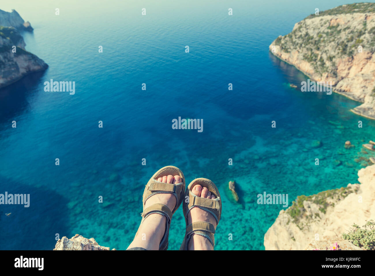 Feet above the sea bay Stock Photo - Alamy