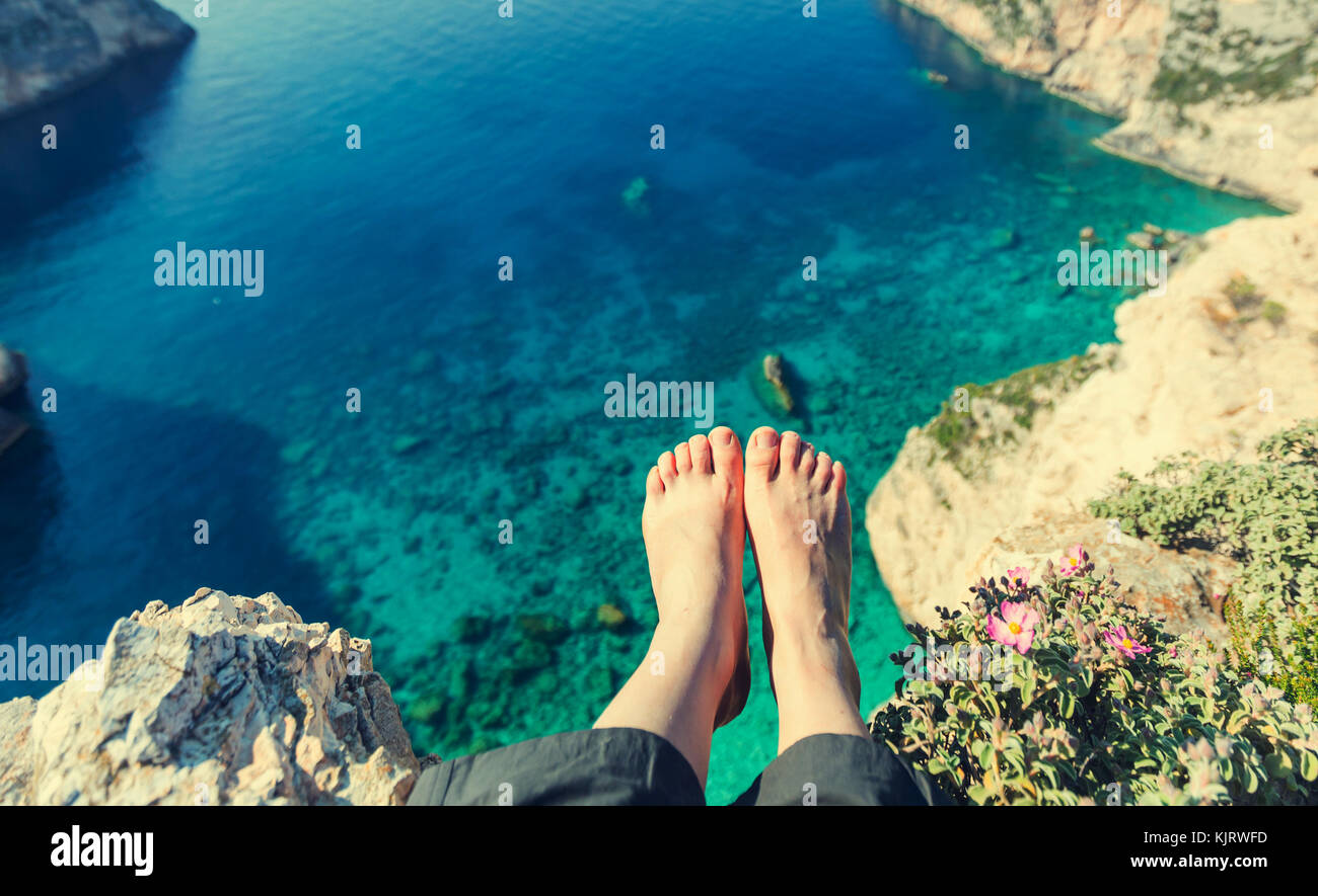Feet above the sea bay Stock Photo - Alamy
