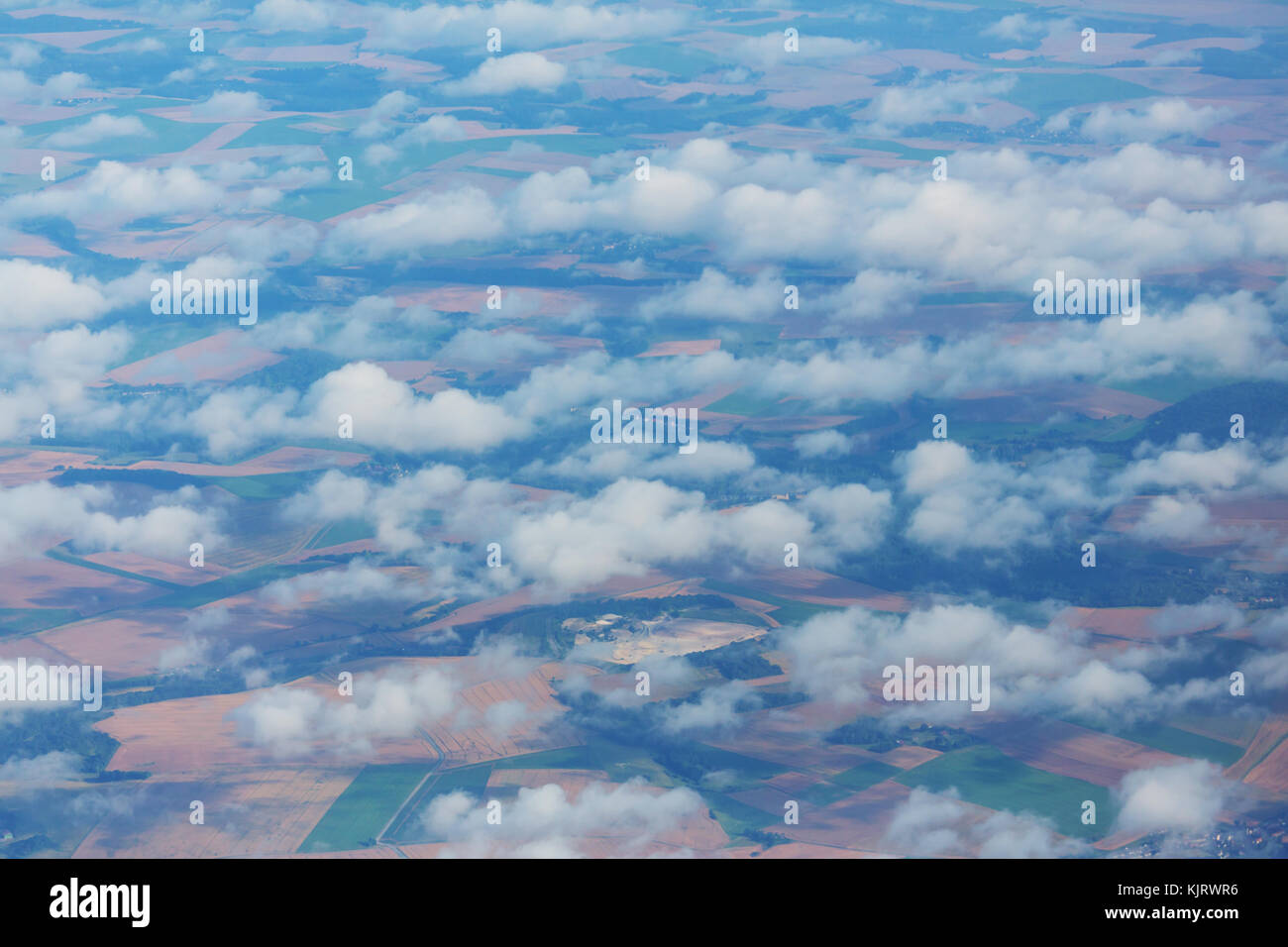 Aerial view from aircraft flying in high altitude. Landscape from above ...