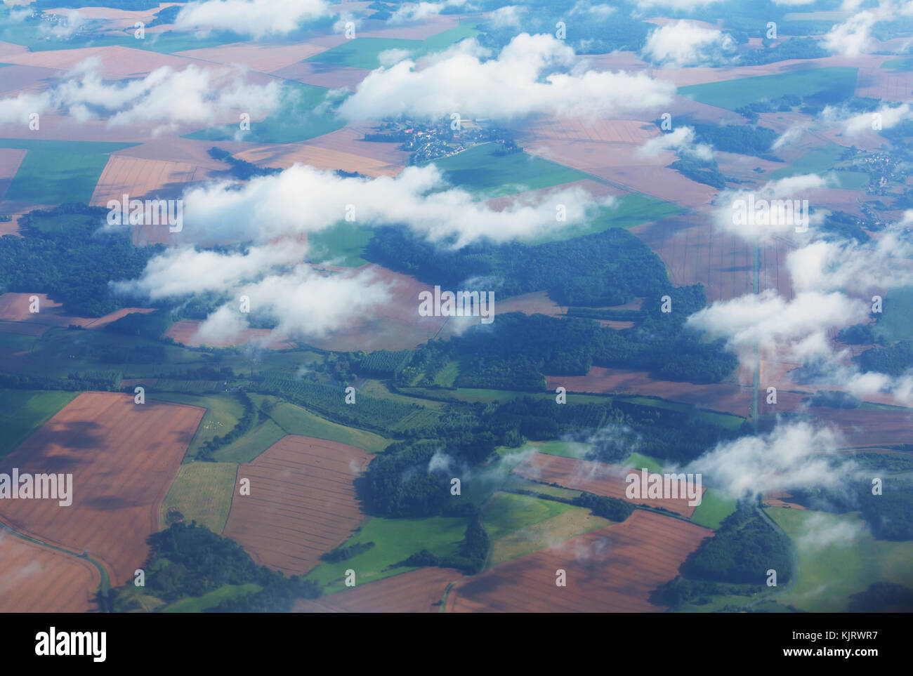 Aerial view from aircraft flying in high altitude. Landscape from above ...