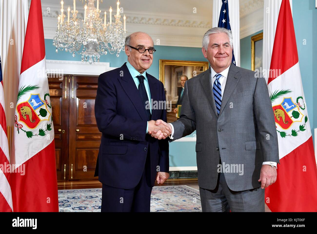 Peruvian Foreign Minister Victor Ricardo Luna Mendoza (left) greets U.S ...
