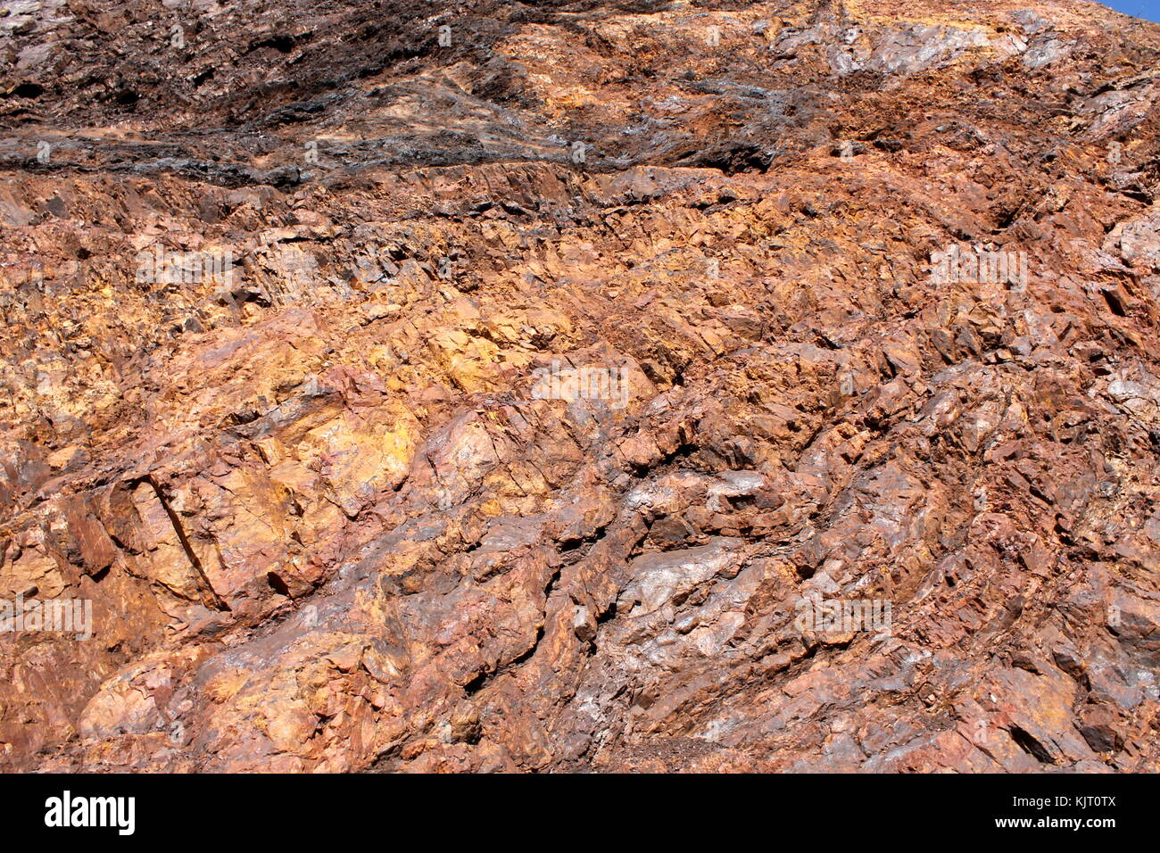 red chert rocks on a hill in the Marin Headlands in the Bay Area ...