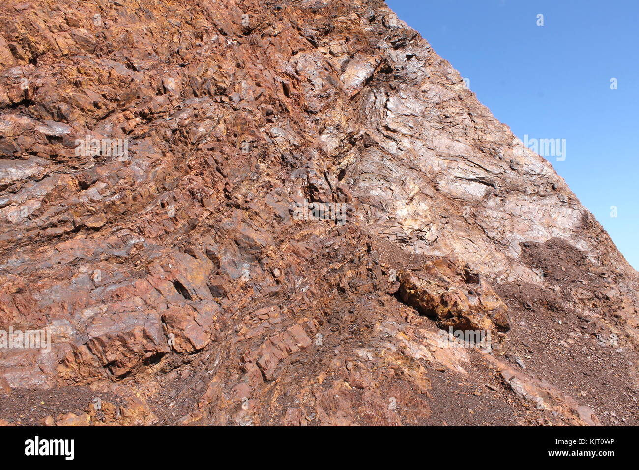 red chert rocks on a hill in the Marin Headlands in the Bay Area ...